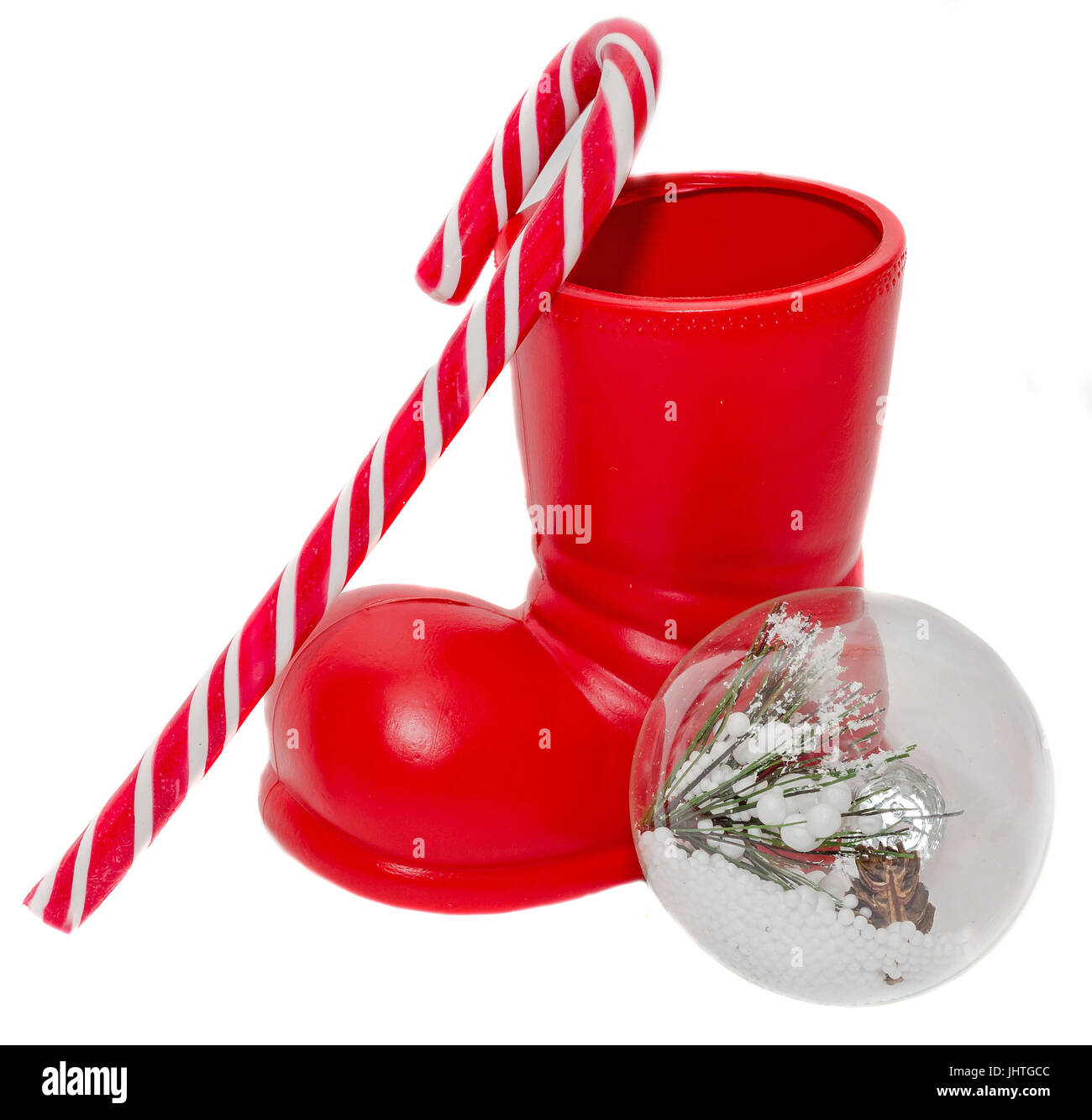 Red Santa Claus boots, shoes and candy sticks isolated, white ...