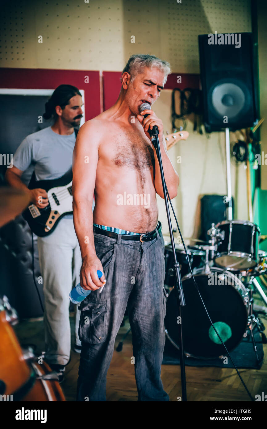 Behind the scene. Rock band practice in the messy recording music ...