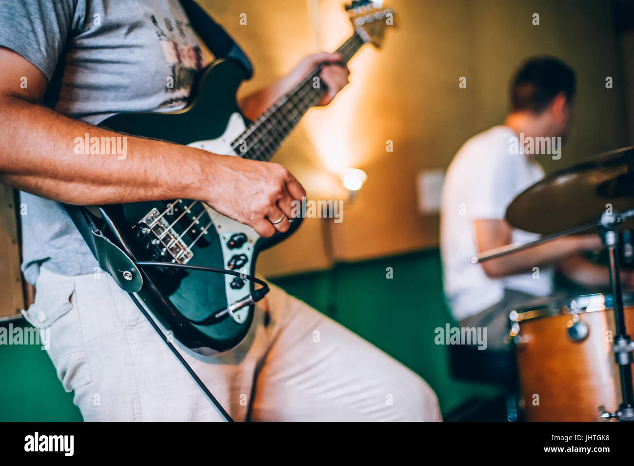 Behind the scene. Rock band practice in the messy recording music ...