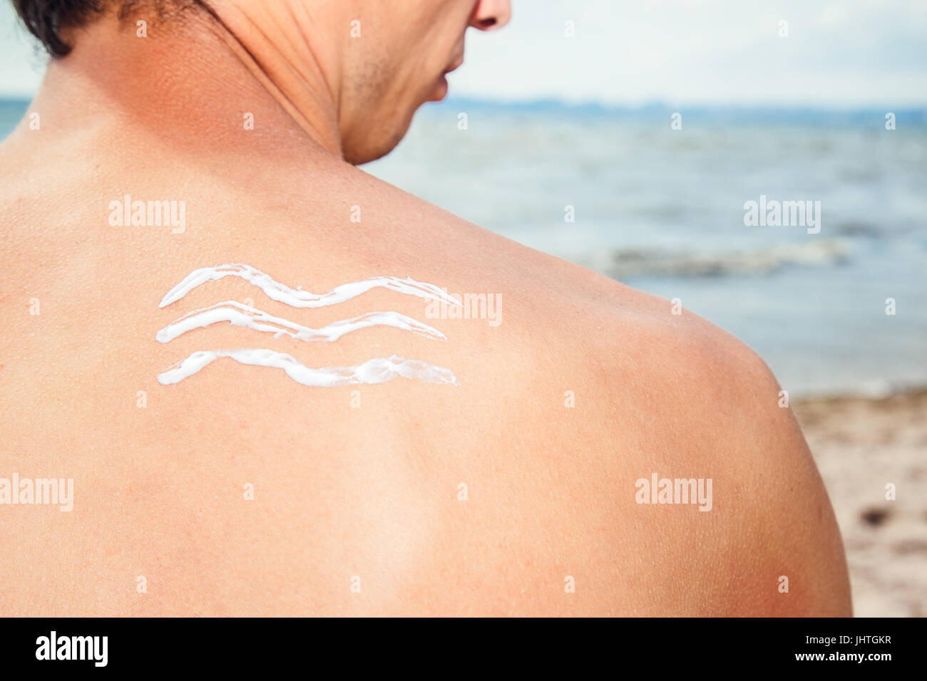 Man Applying Suntan Lotion Woman High Resolution Stock Photography and ...