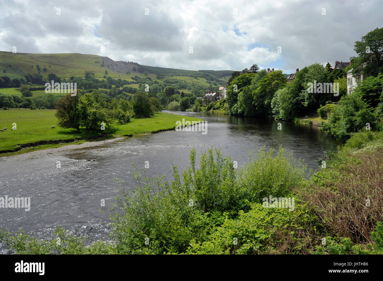 The River Dee winding through the village of Carrog in the Dee Valley ...