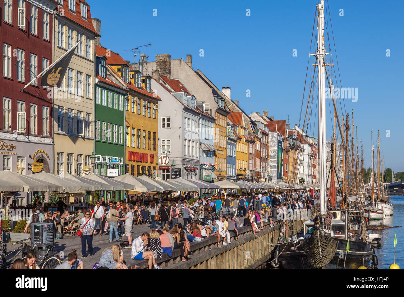People at Nyhavn (New Harbor) in Copenhagen, Denmark Stock Photo - Alamy