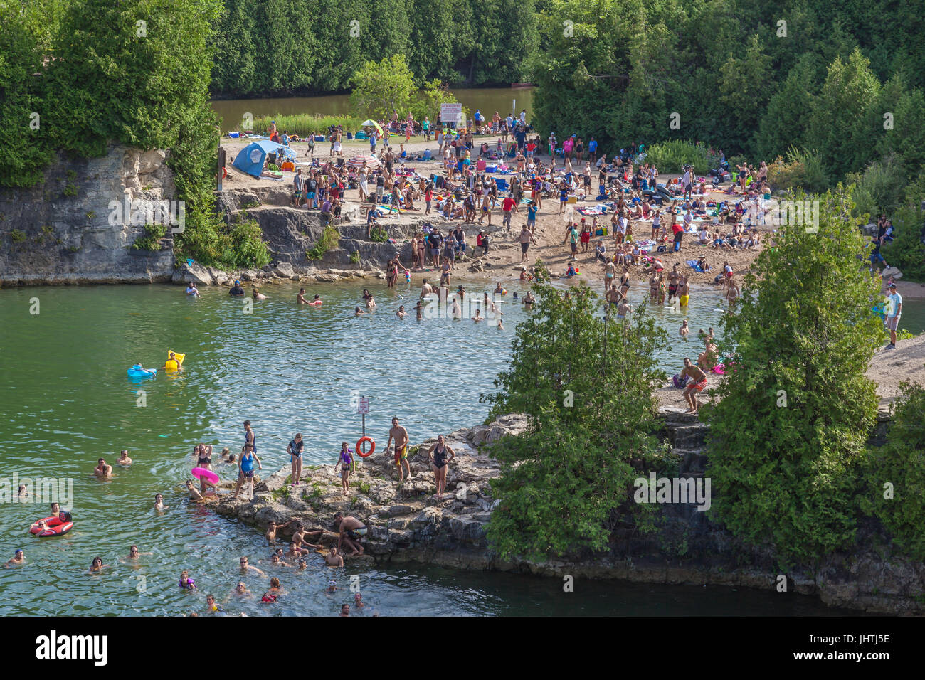 People swimming in Elora Quarry conservation area. Elora, Ontario ...
