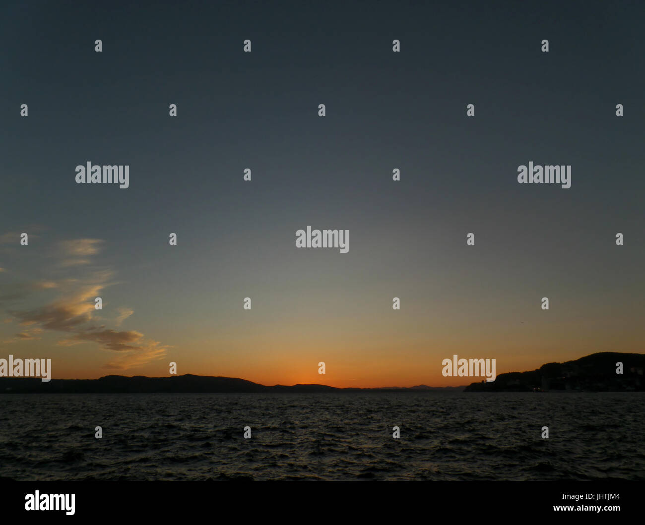 Deep Blue and Orange Norwegian Sunset Sky over the North Sea in Bergen, Norway Stock Photo - Alamy