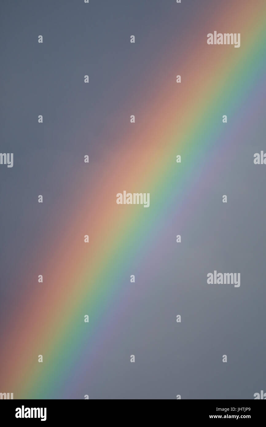 Vertical photo of rainbow in the sky of Bangkok urban, Thailand Stock ...