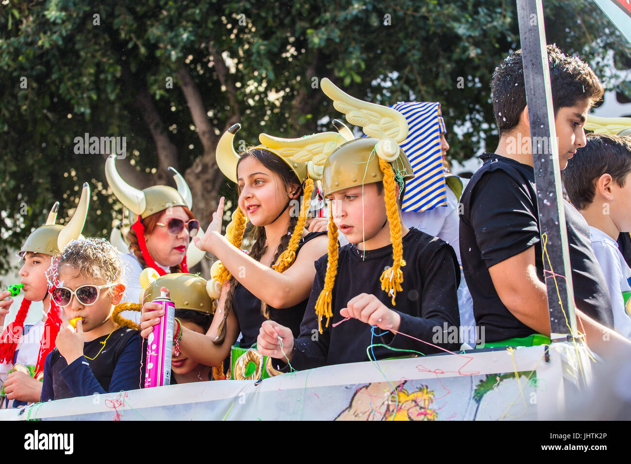 LIMASSOL, CYPRUS - FEBRUARY 26: Happy people in teams dressed with ...