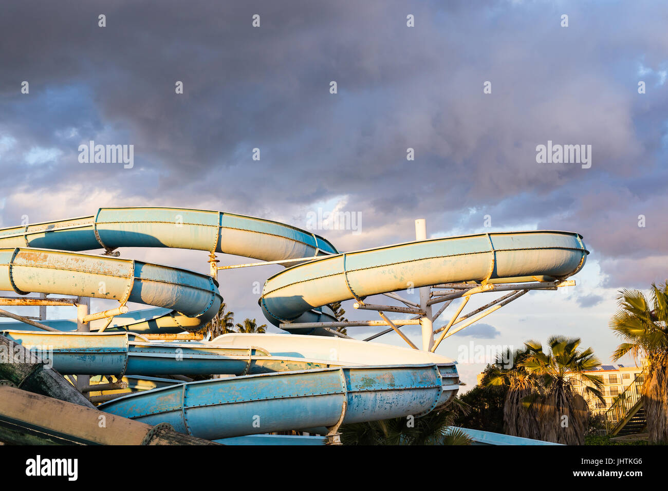 An abandoned big old water slide in the Cyprus town Stock Photo - Alamy