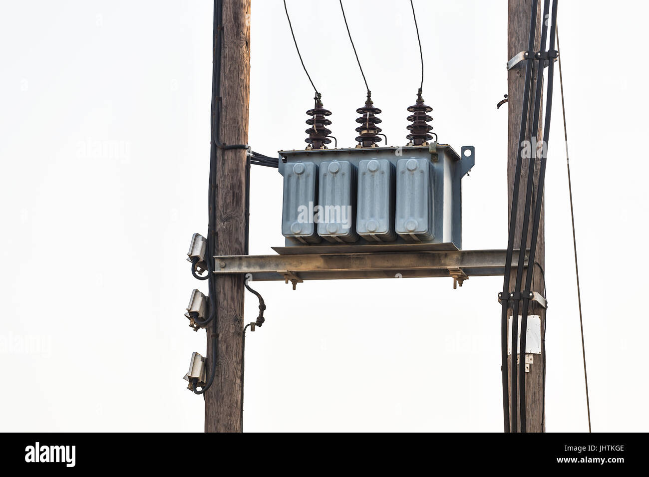 Voltage power transformer on electricity post Stock Photo - Alamy