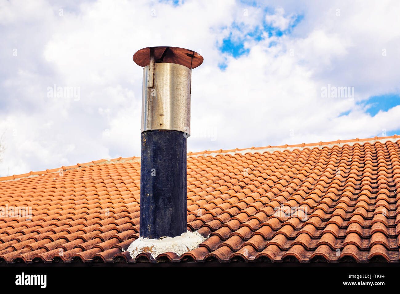 Chimney stack and roofing on the new building Stock Photo - Alamy
