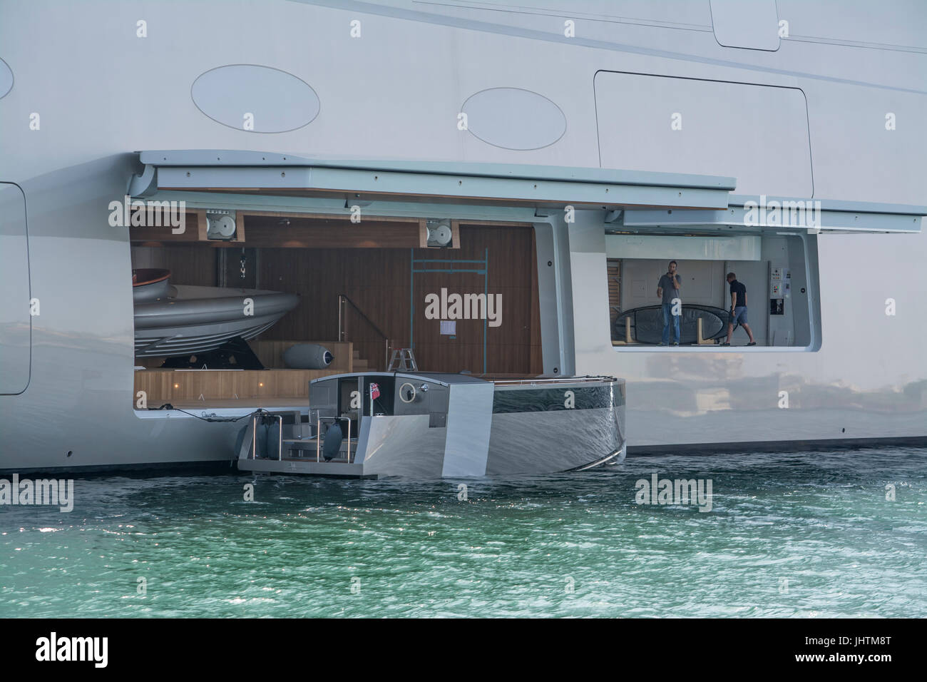 Storage compartments and crewmen on the "A" Sailing Yacht one of the ...