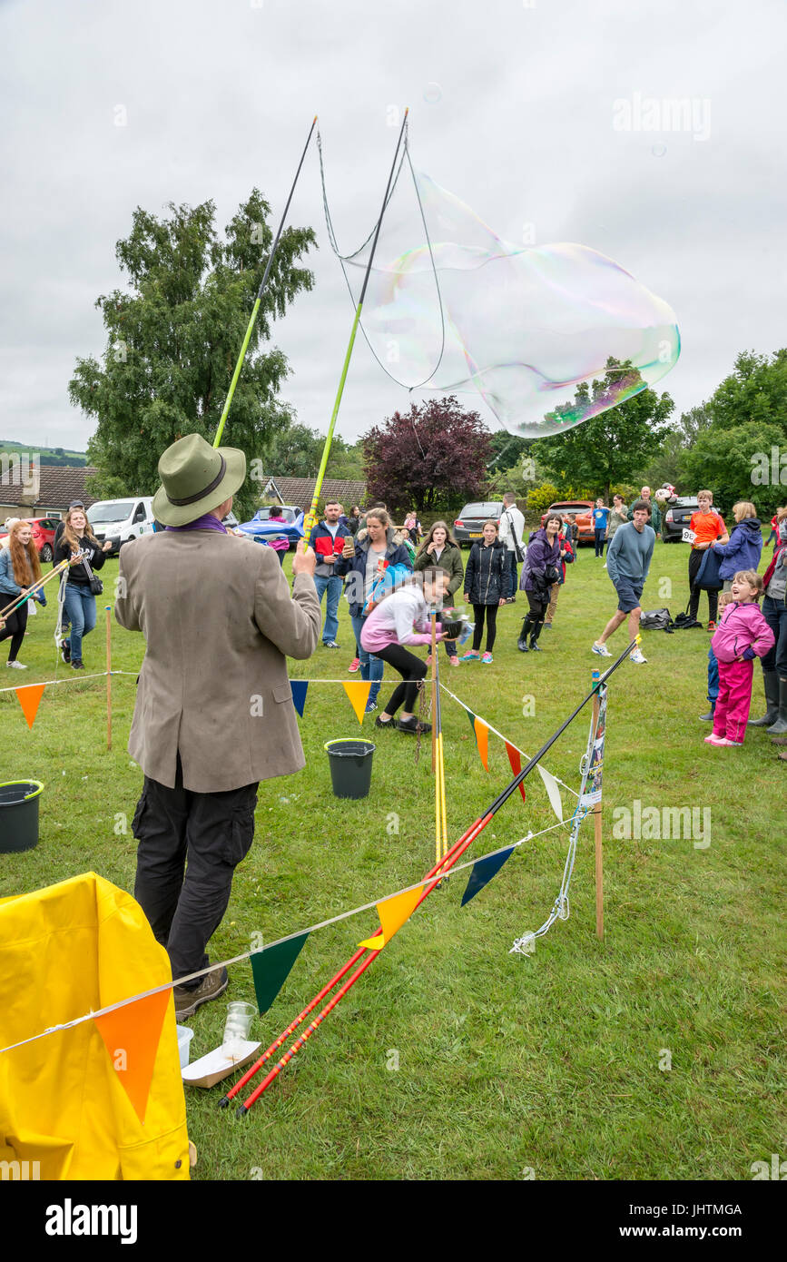 Giant bubbles at the village carnival, Charlesworth, Derbyshire ...