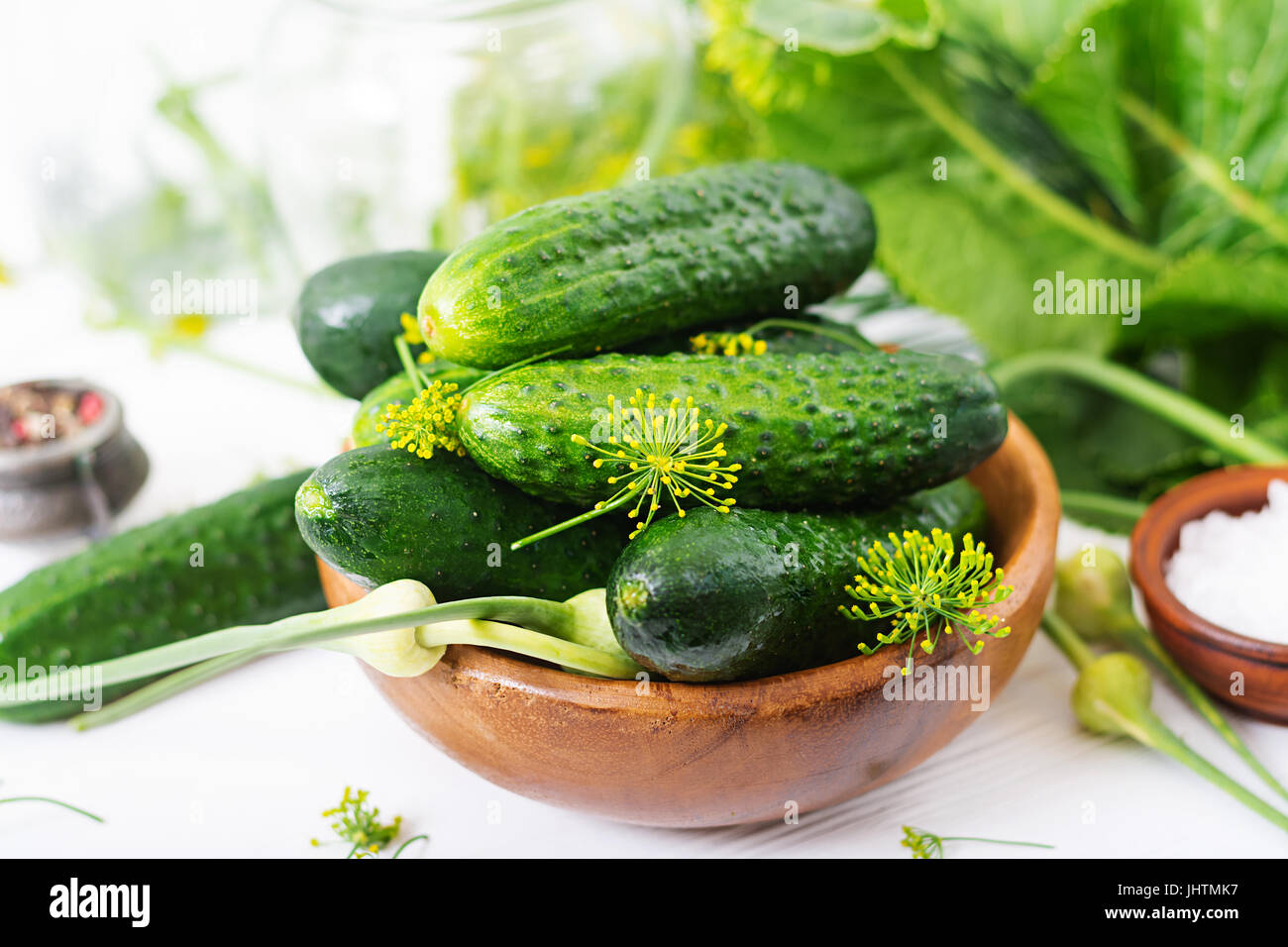 Preparation pickled marinated cucumbers, herbs and salt Stock Photo - Alamy
