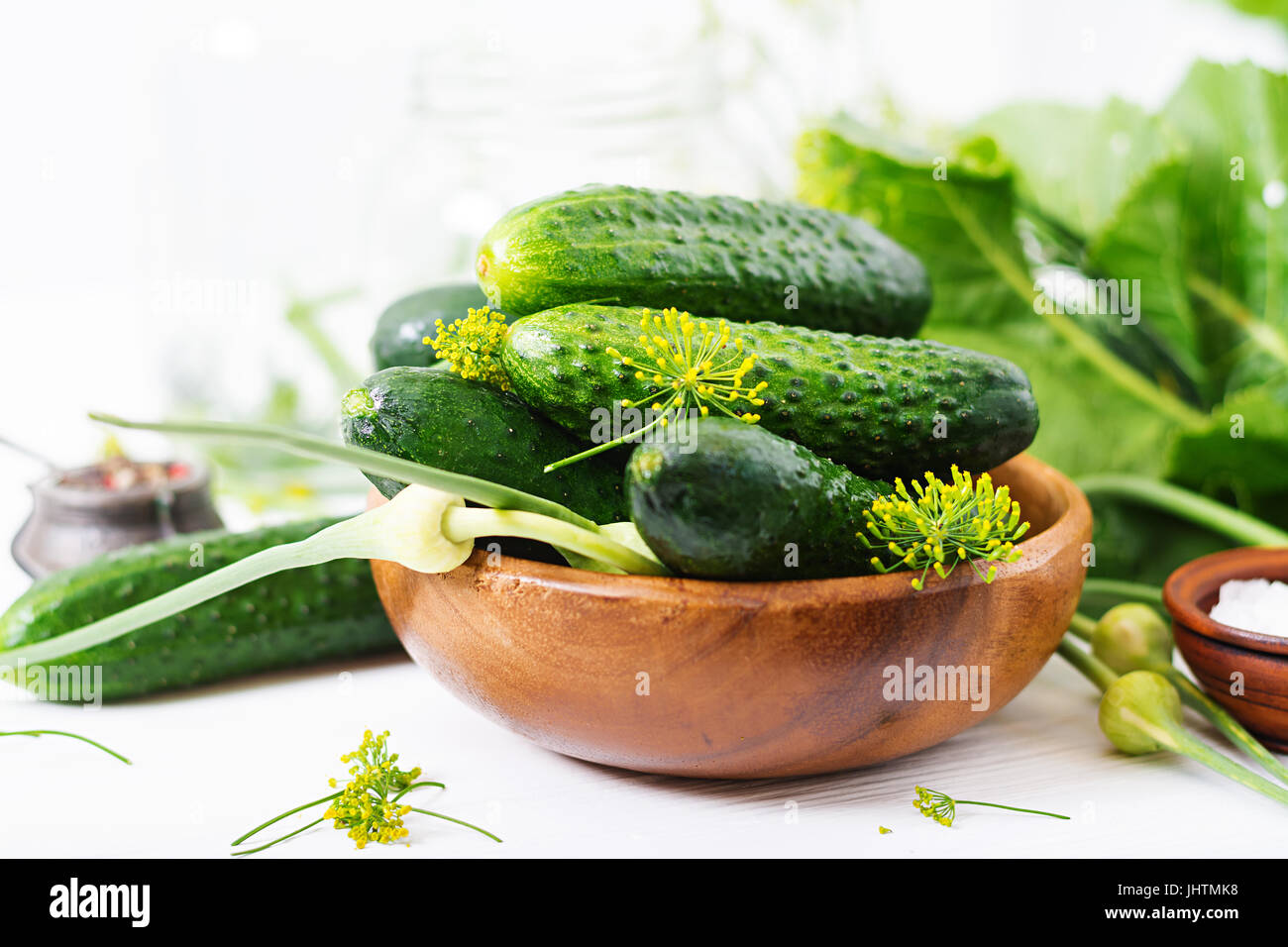 Preparation pickled marinated cucumbers, herbs and salt Stock Photo - Alamy