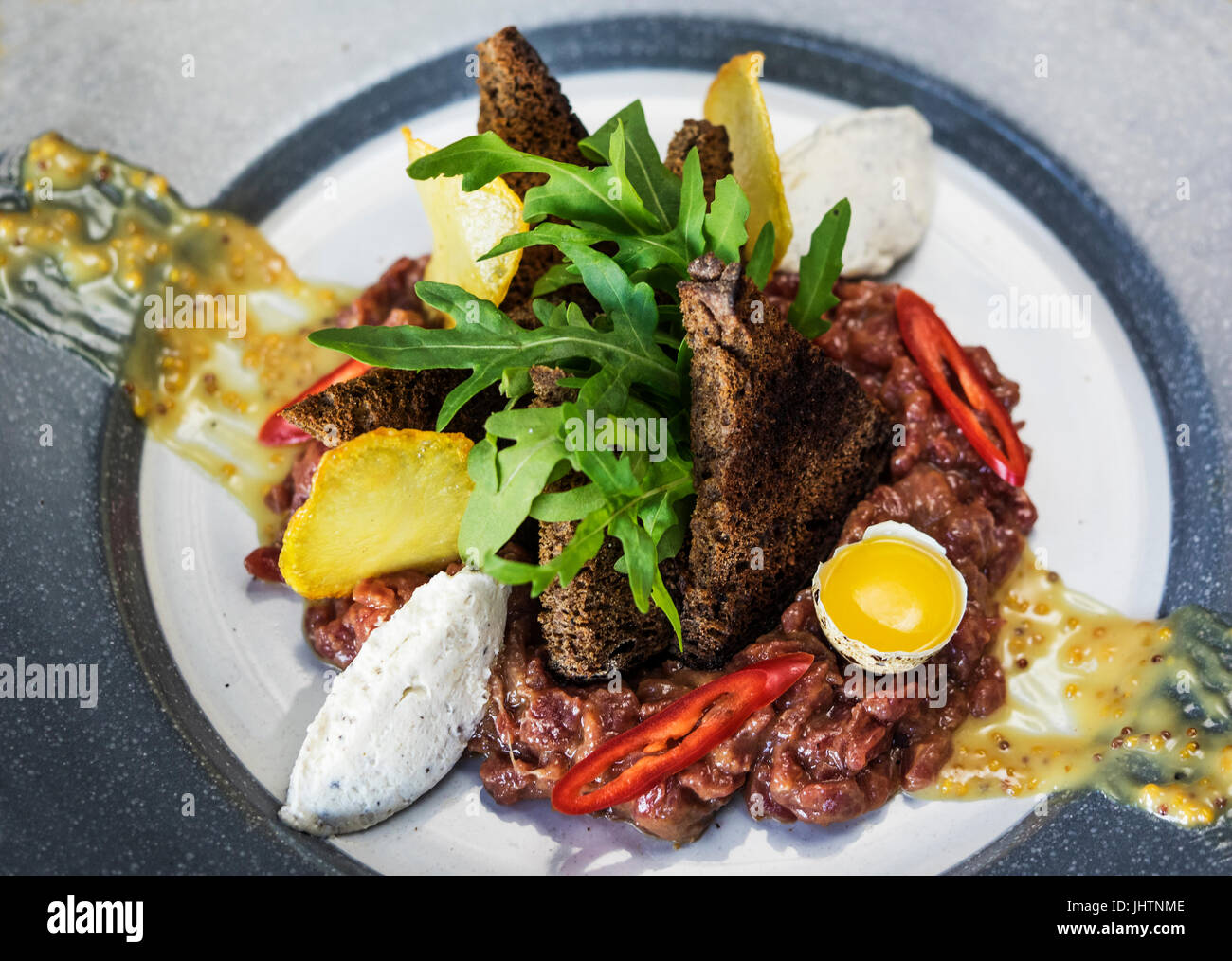 Ukrainian beef tartare with truffle cheese Stock Photo - Alamy