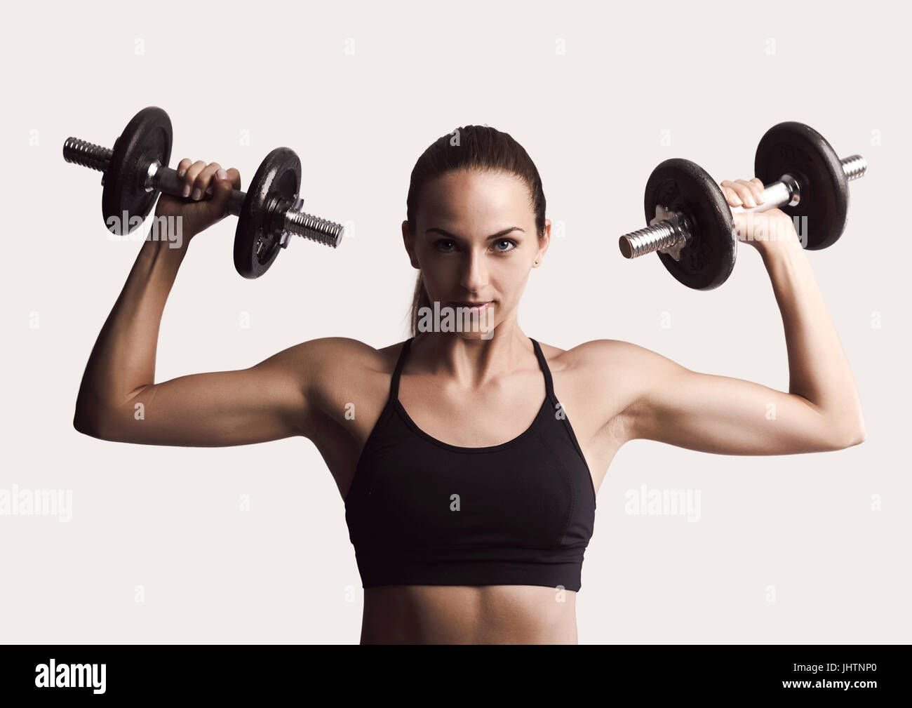 Overhead press dumbbells hi-res stock photography and images - Alamy