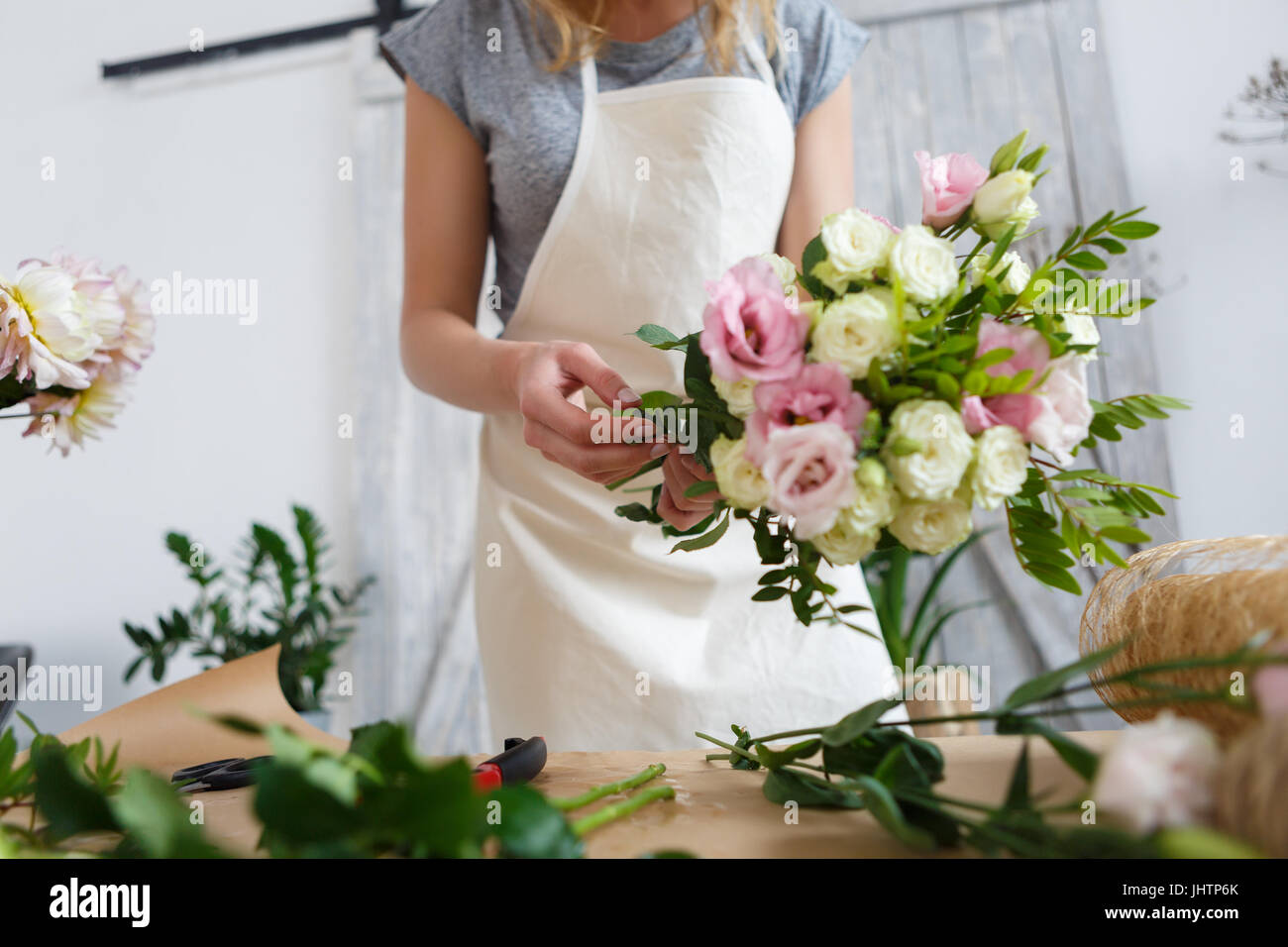Image of florist making bouquet Stock Photo - Alamy