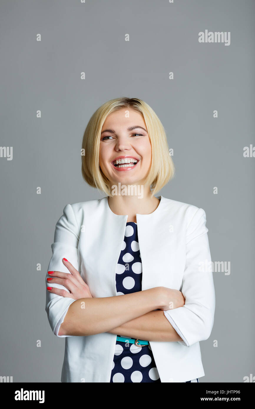 Beautiful model with arms crossed Stock Photo - Alamy