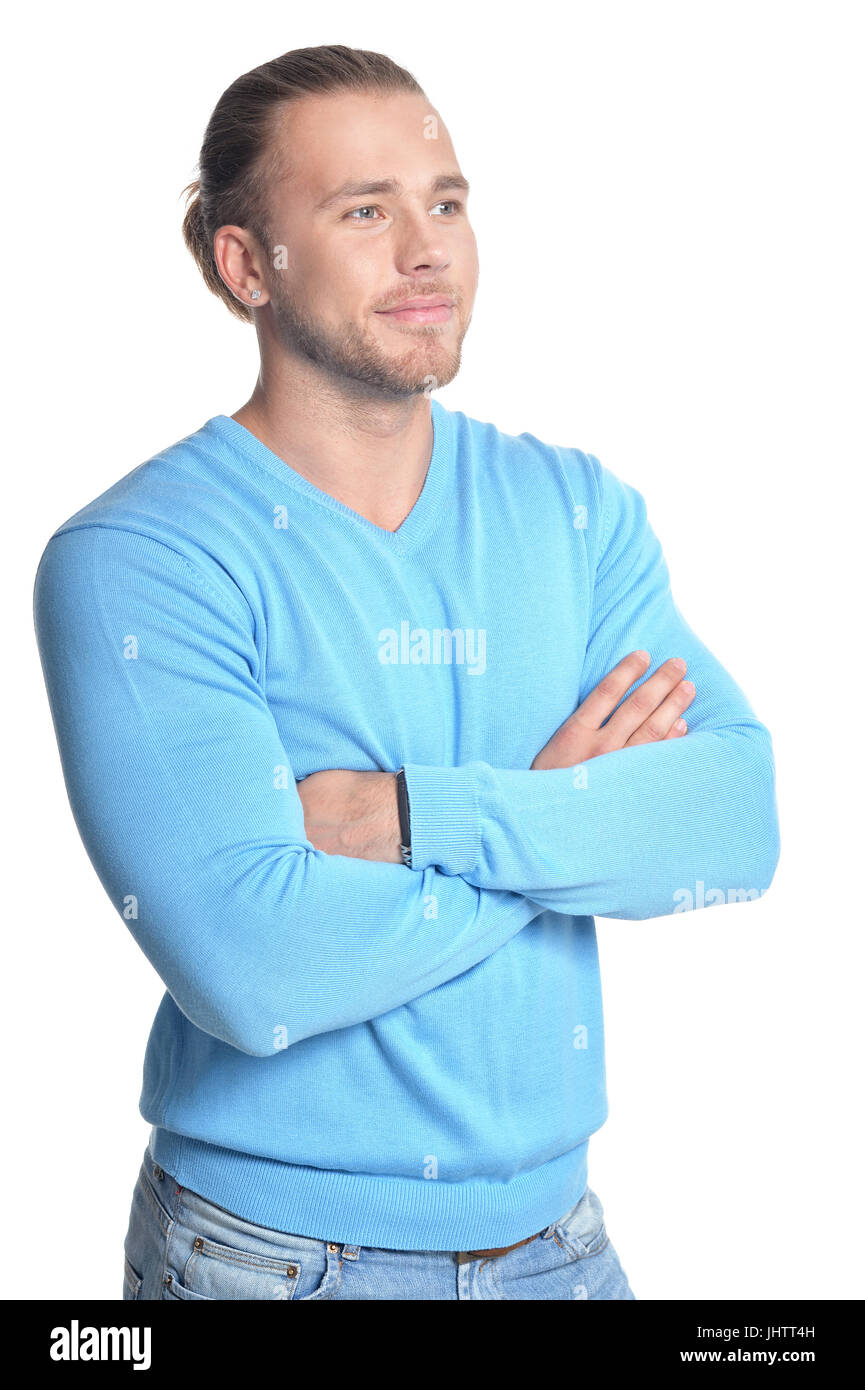 Handsome young man in blue sweater Stock Photo - Alamy