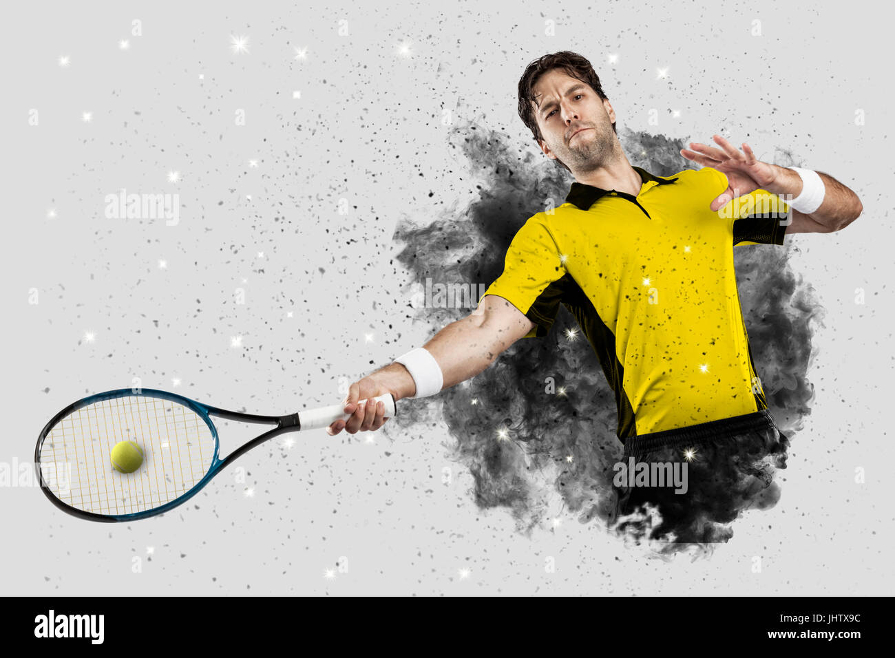 Tennis Player with a yellow uniform coming out of a blast of smoke ...
