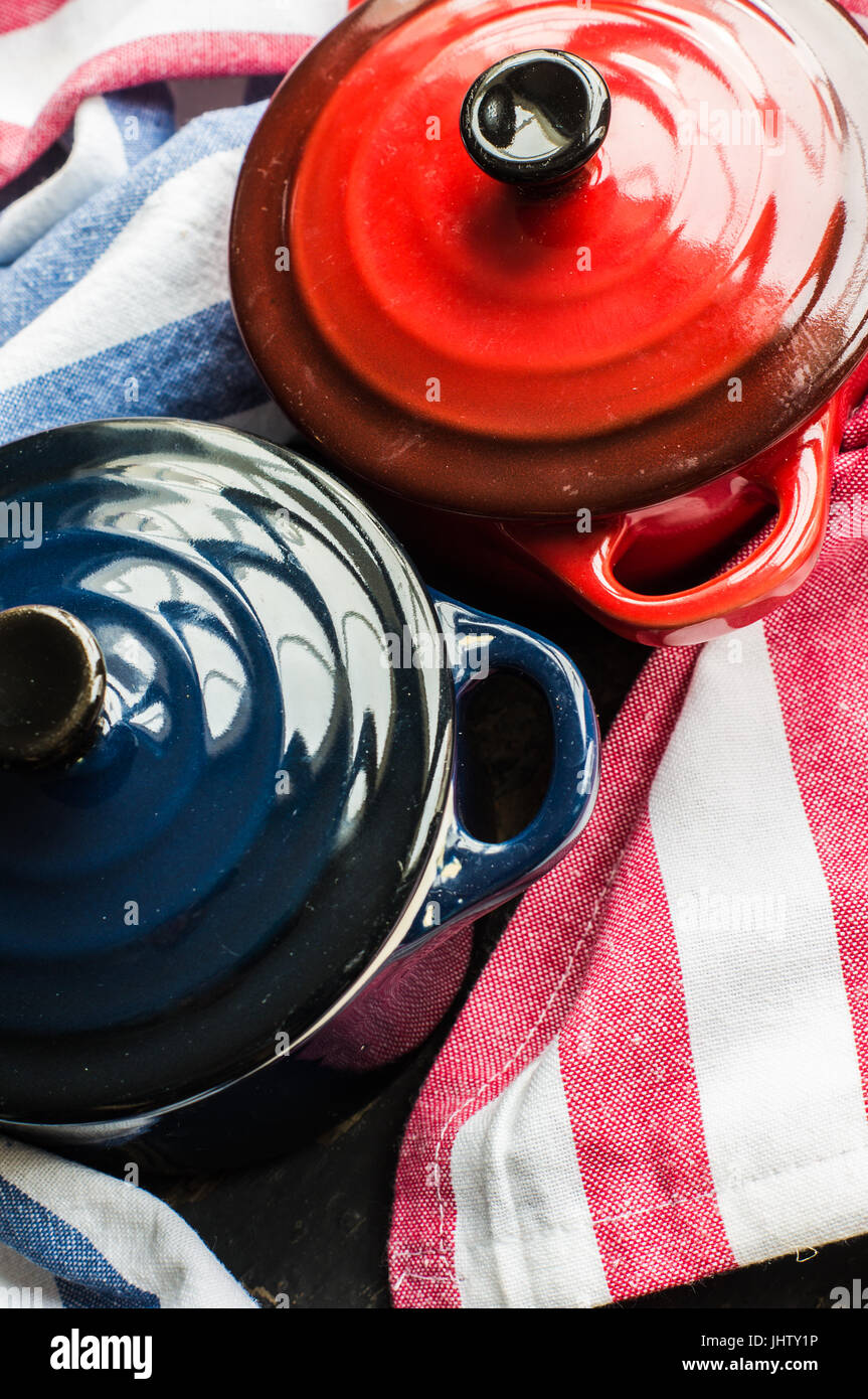 Cooking pot and napkin on rustic woodn background Stock Photo - Alamy