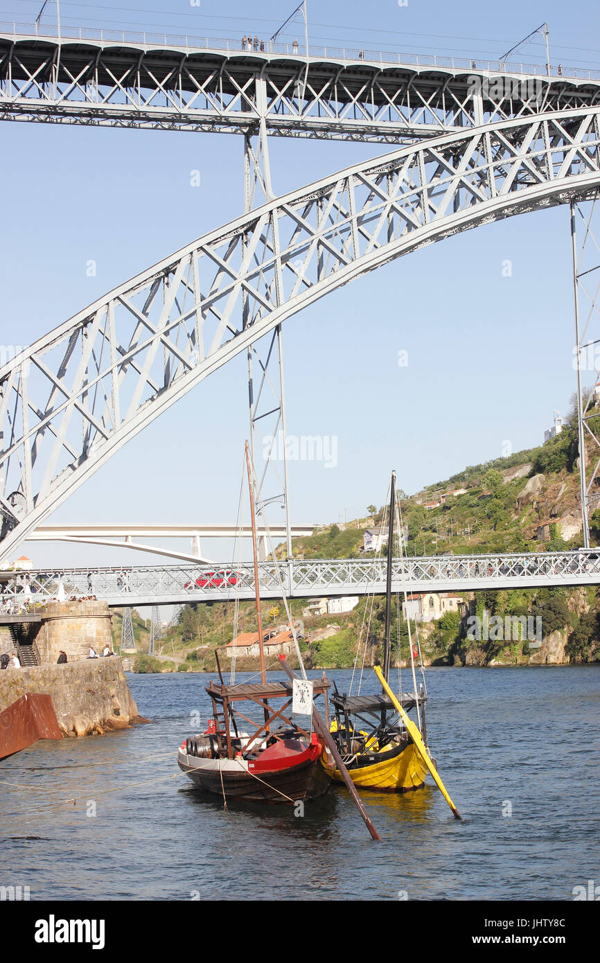 Colorful tour boats Barcos Rabelos sail the Douro River at Porto ...