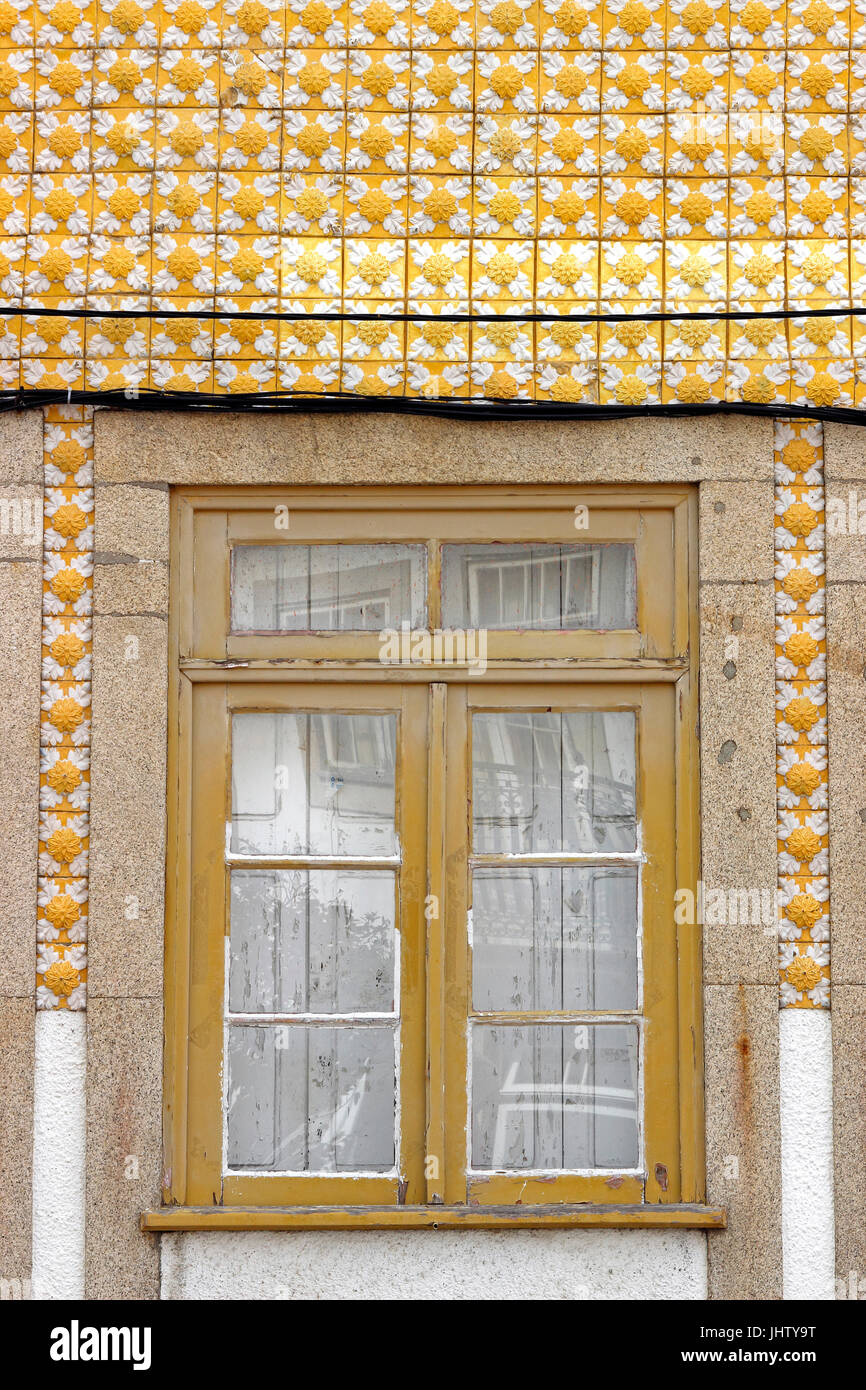 Yellow tile facade building residential neighborhood vila do con hi-res ...