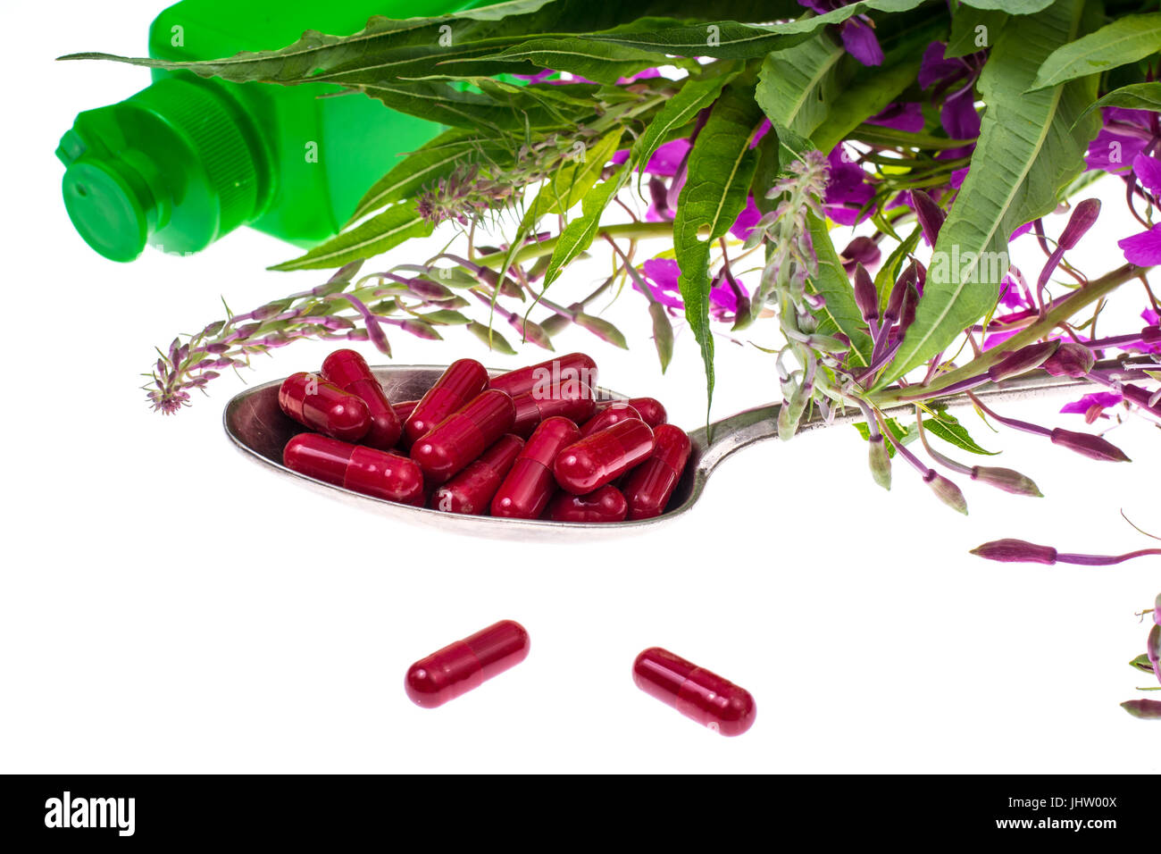 Homeopathy. Herbal capsules, medicinal plants on white background ...