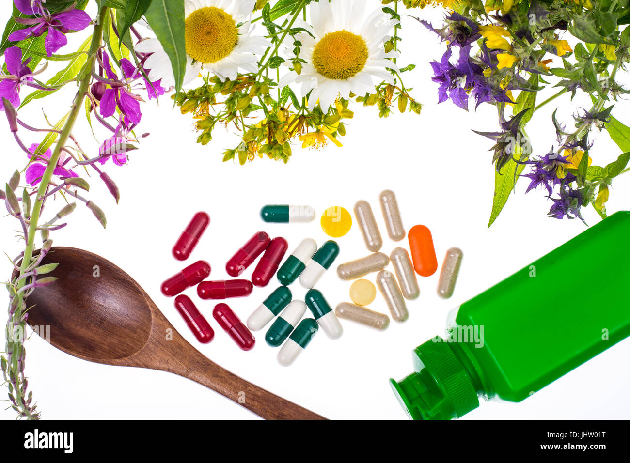 Homeopathy. Herbal capsules, medicinal plants on white background ...