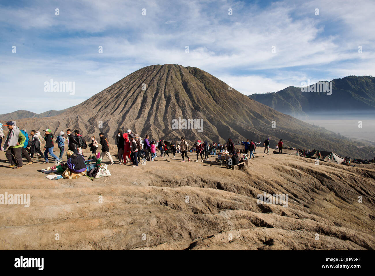 Tourists climbing to crater of Mount Bromo active volcano, East Java ...