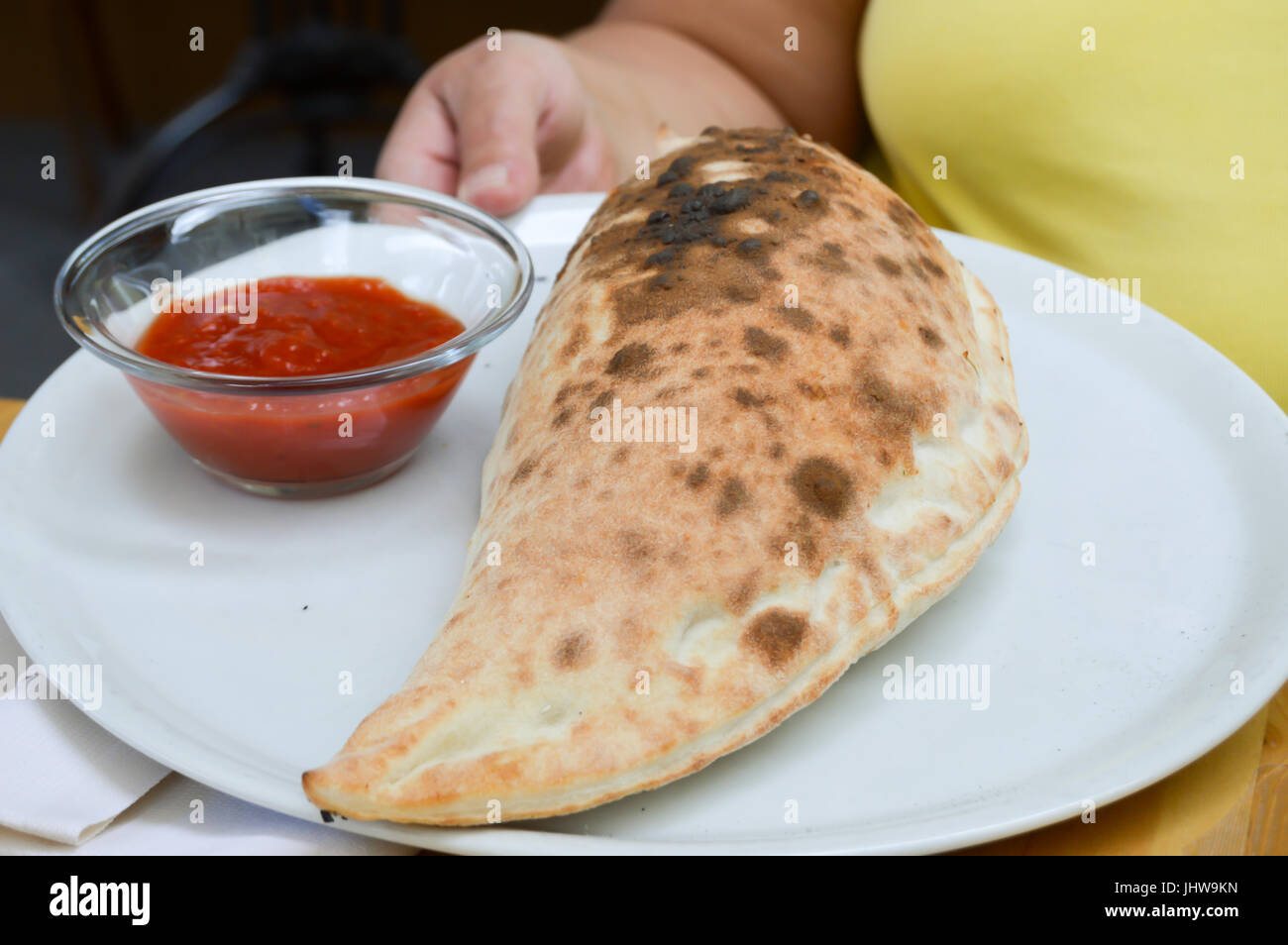 Pizza calzone with chicken and pepper hi-res stock photography and ...