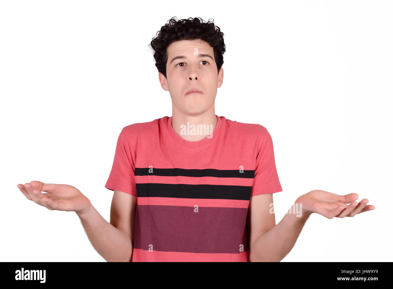 Portrait of a young man who do not understand what is happening ...