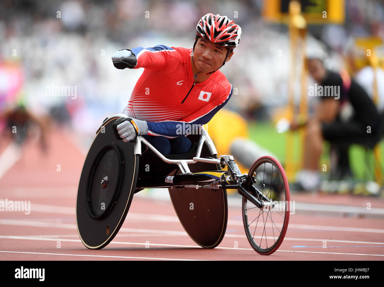 Japan's Masayuki Higuchi reacts after the Men's 1500m T54 third heat ...
