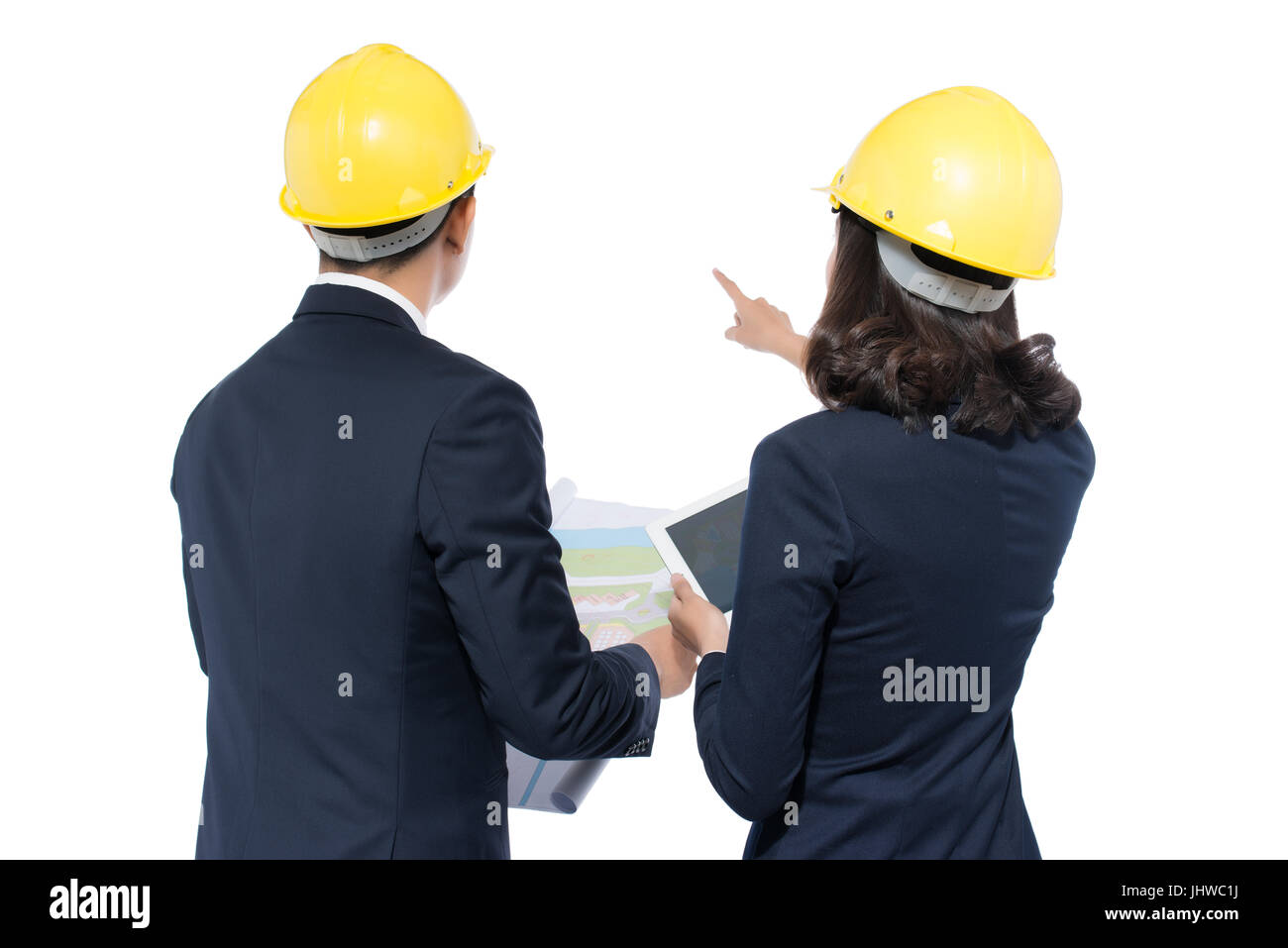 Team of engineers or architects standing over white Stock Photo - Alamy