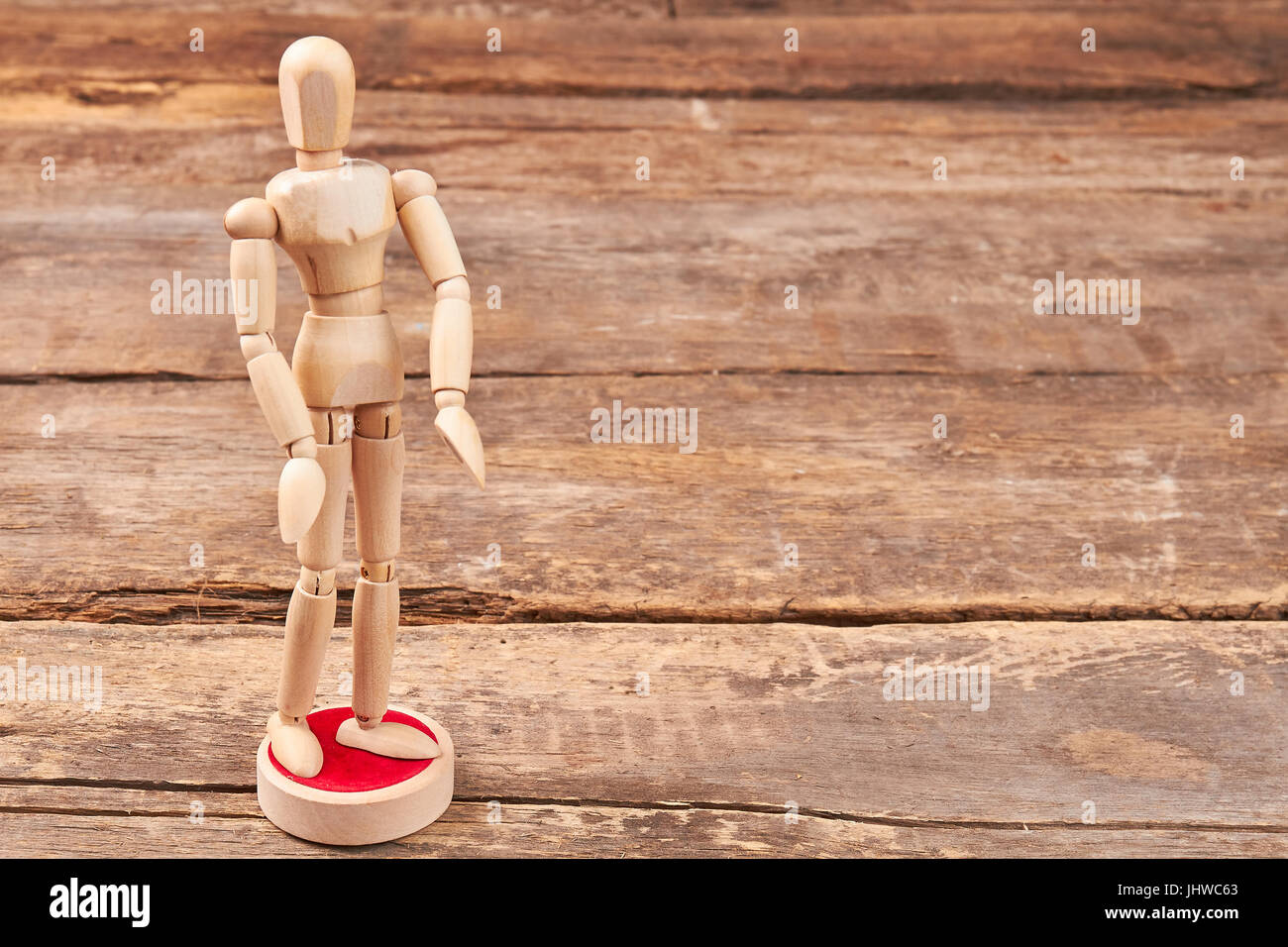 Wooden modeling figure, wooden background Stock Photo - Alamy