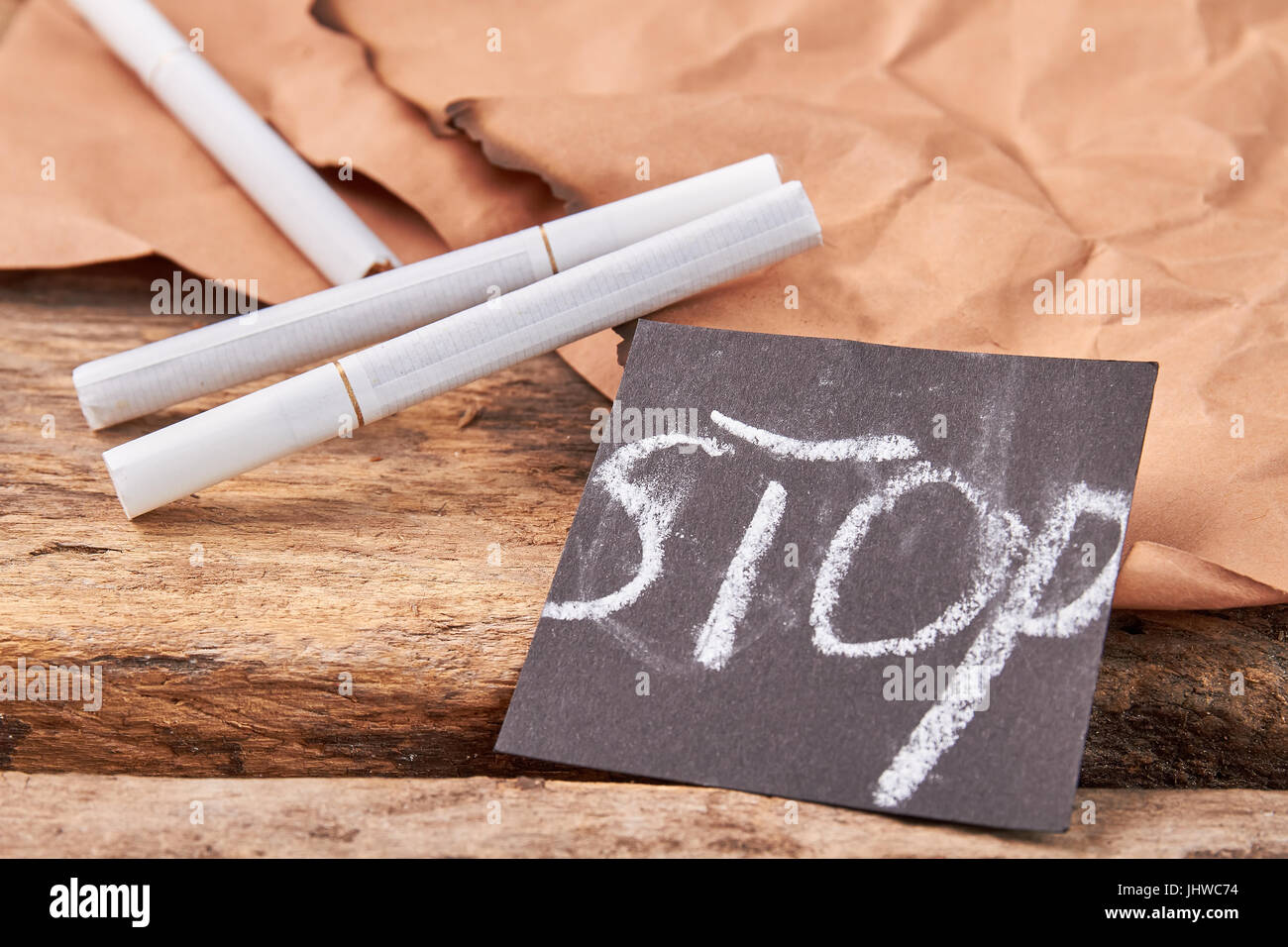 Burned aged paper and cigarettes Stock Photo - Alamy