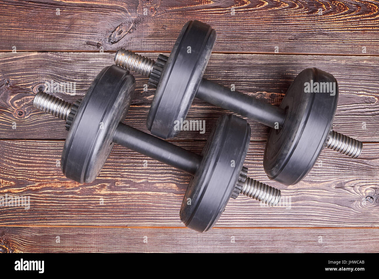 Two steel dumbbells, top view Stock Photo - Alamy