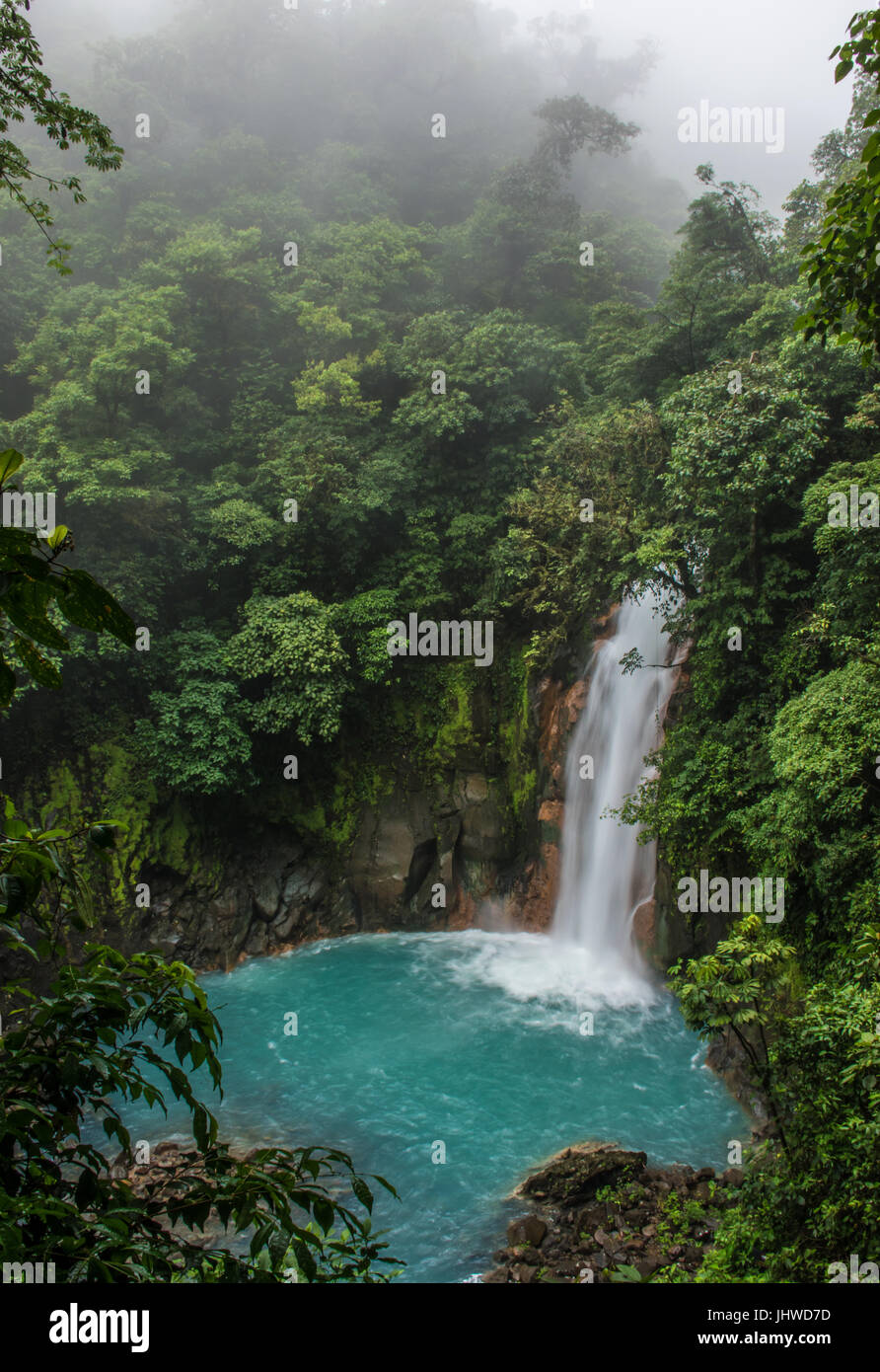 Rio Celeste waterfall in the fog, Costa Rica Stock Photo - Alamy