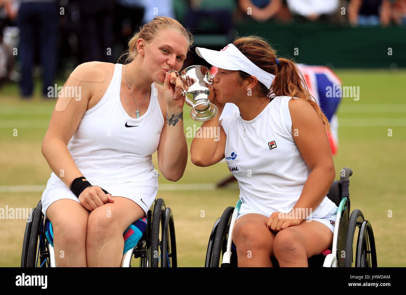 Jordanne Whiley (left) and Yui Kamiji with the trophy after winning the ...