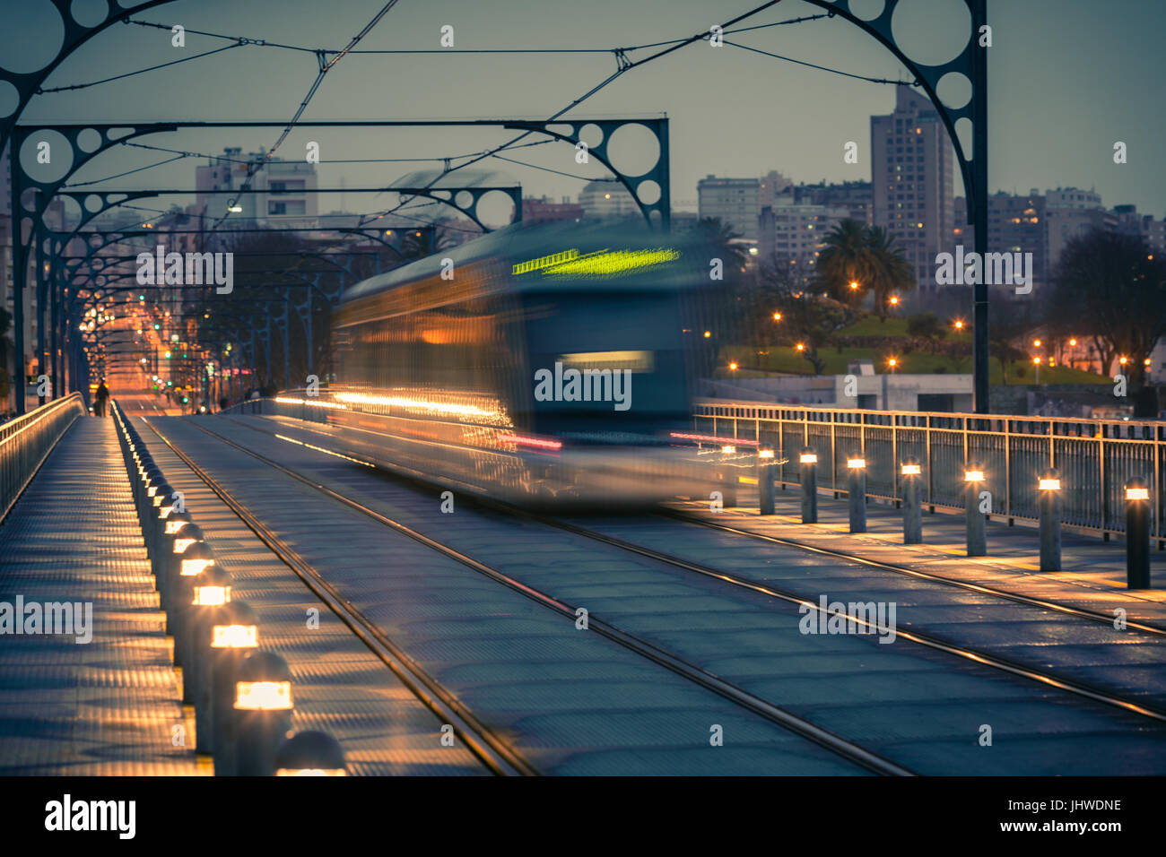 Moving Metro Train on the Bridge of Dom Luiz in Porto. Horizontal shot ...