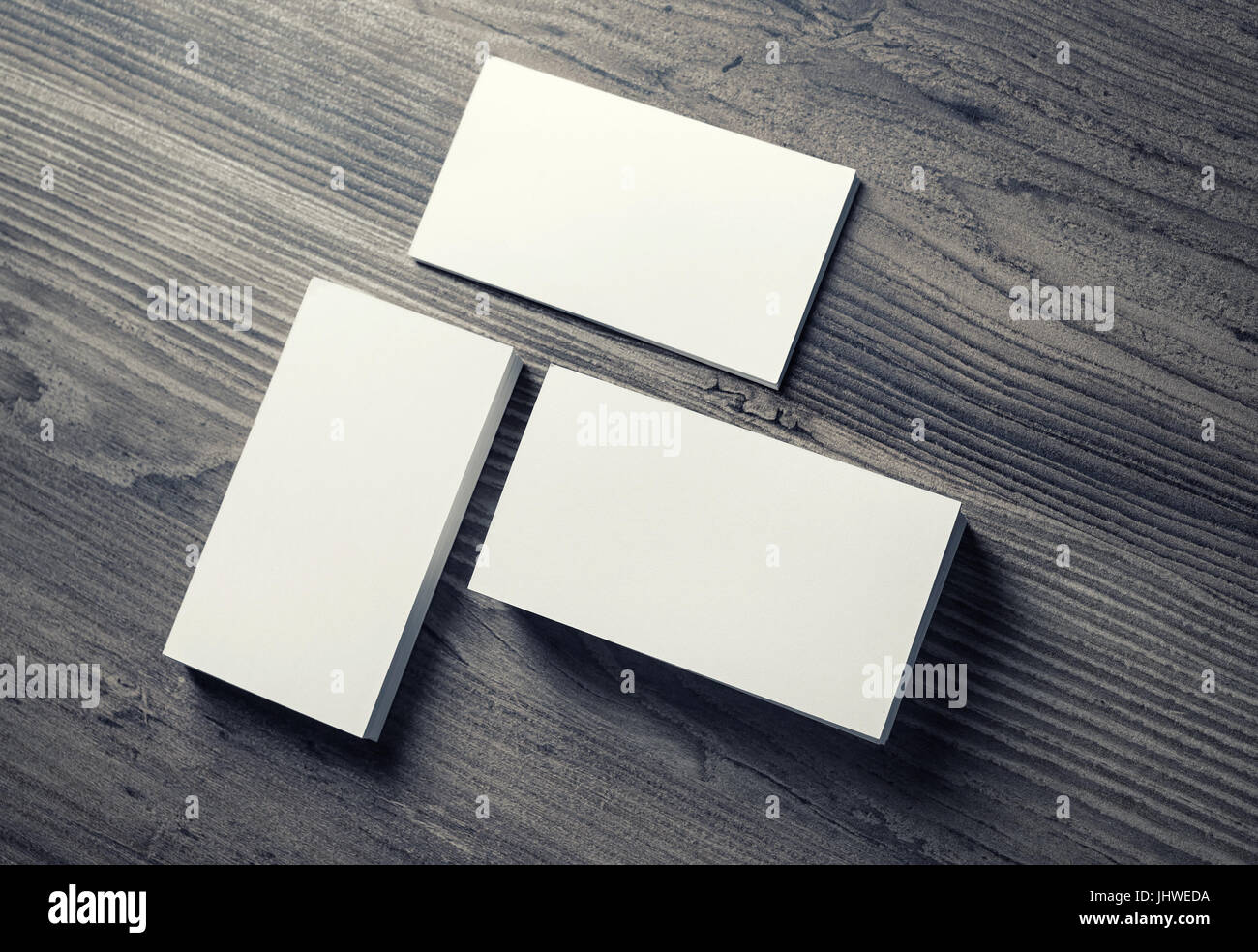 Photo of blank business cards on wooden table background. Template for ...