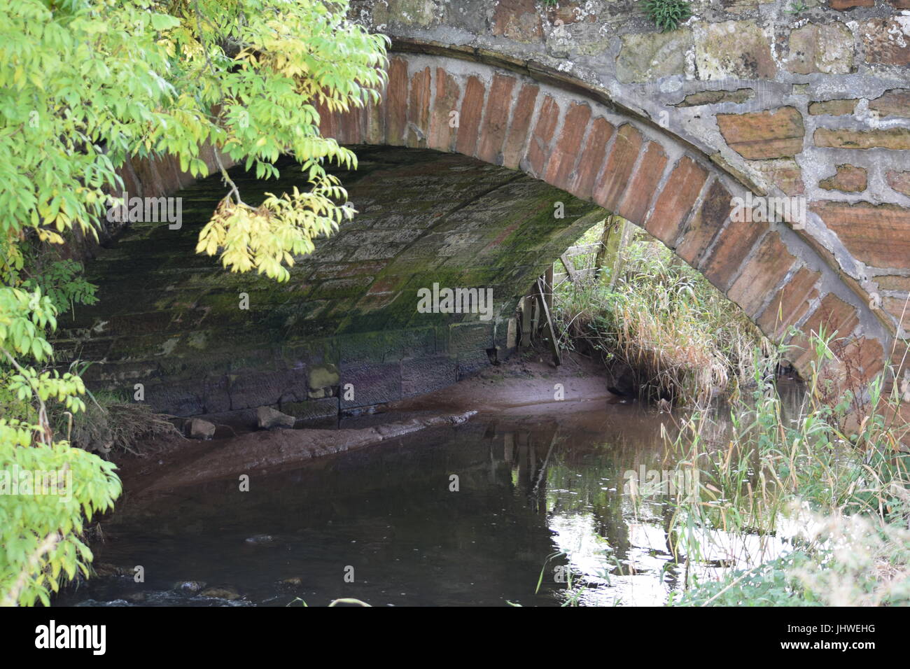 Arched stone bridge Stock Photo - Alamy