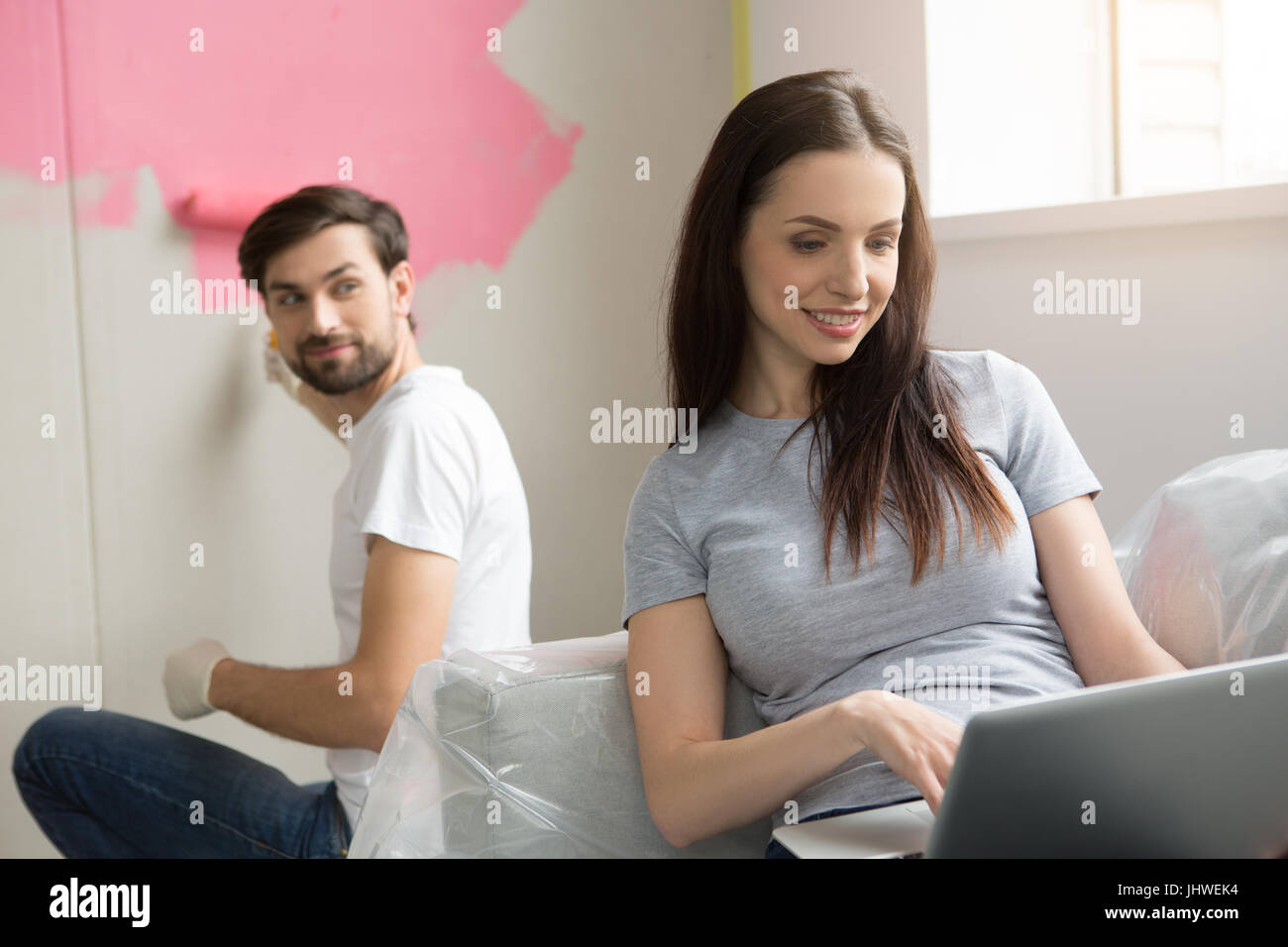 Young couple doing apartment repair together themselves Stock Photo - Alamy