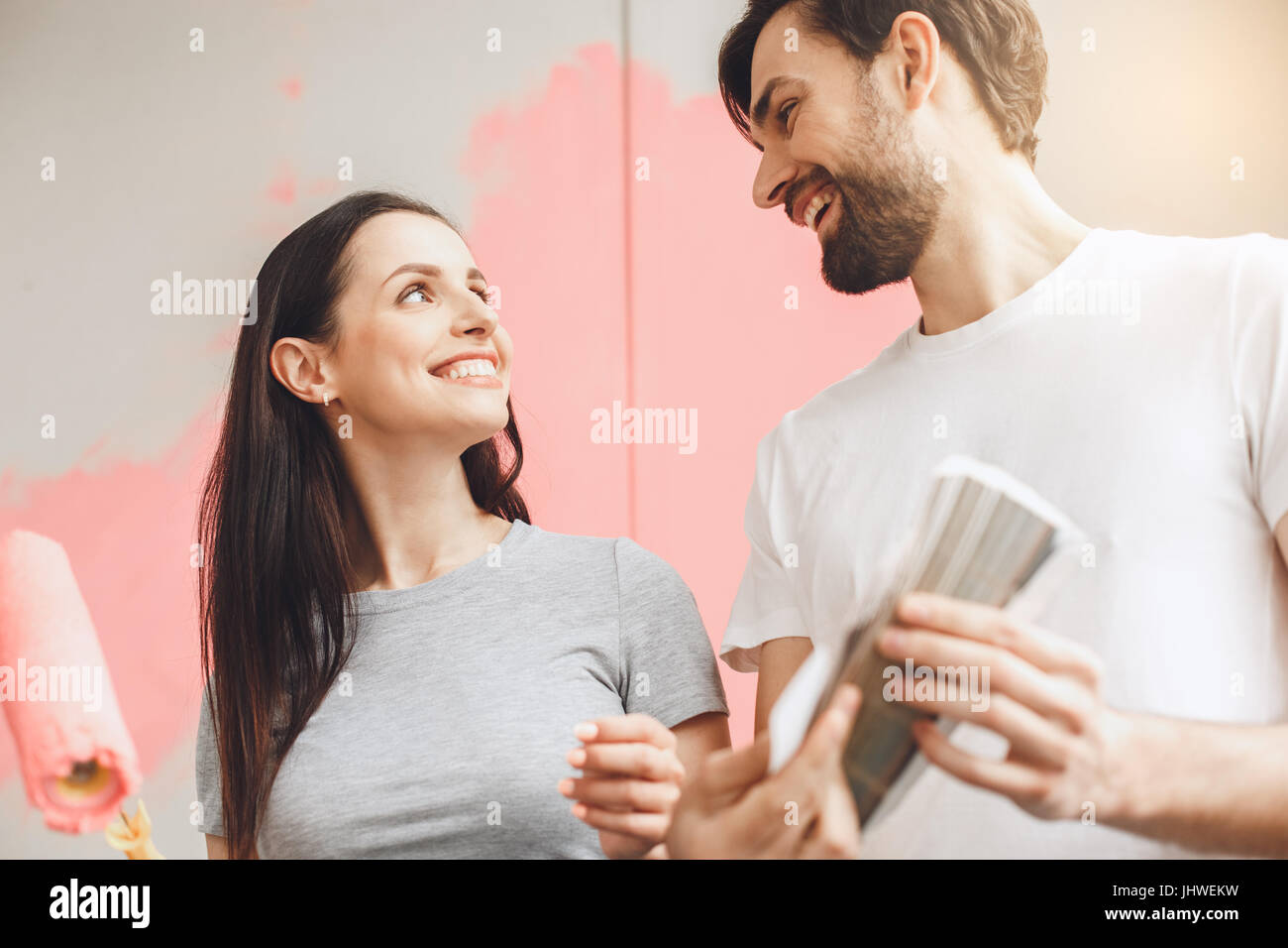 Young couple doing apartment repair together themselves Stock Photo - Alamy