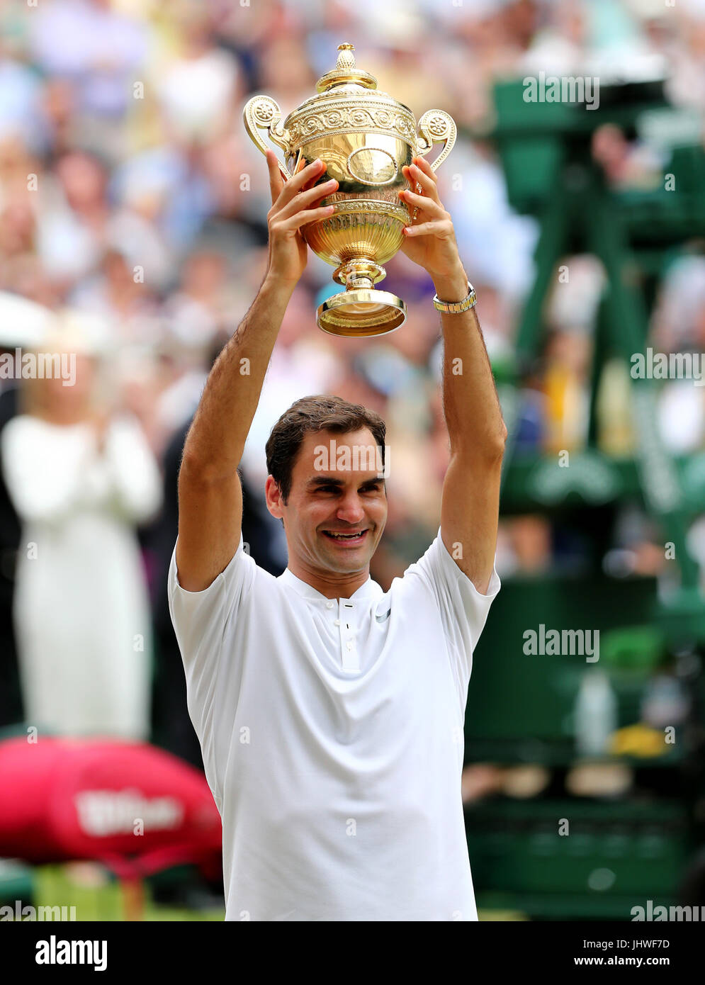 Roger Federer with the trophy after beating Marin Cilic in the ...