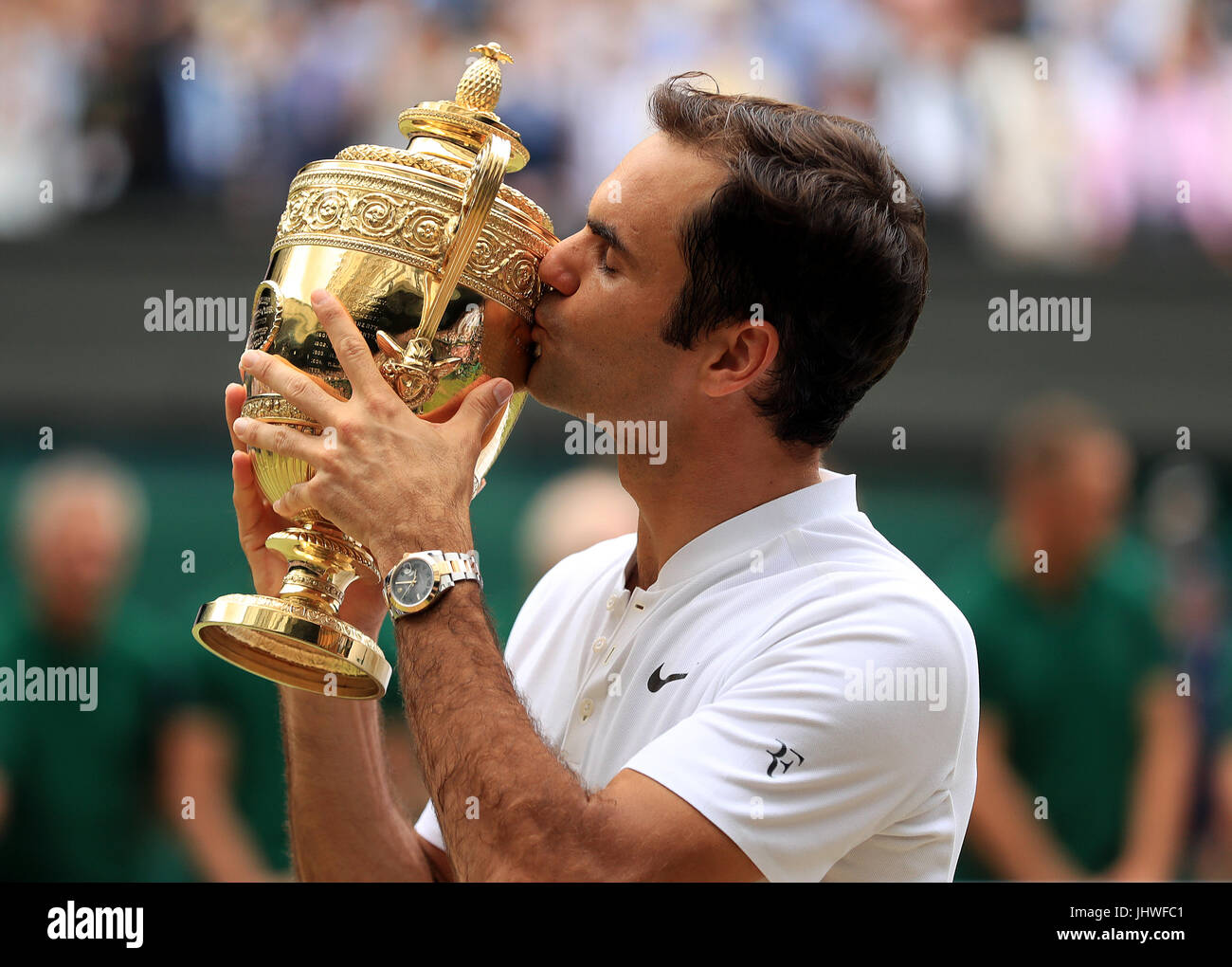 Roger Federer with the trophy after beating Marin Cilic in the ...