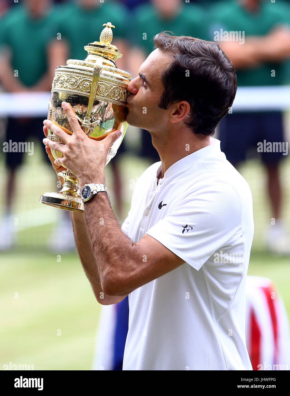 Roger Federer with the trophy after beating Marin Cilic in the ...