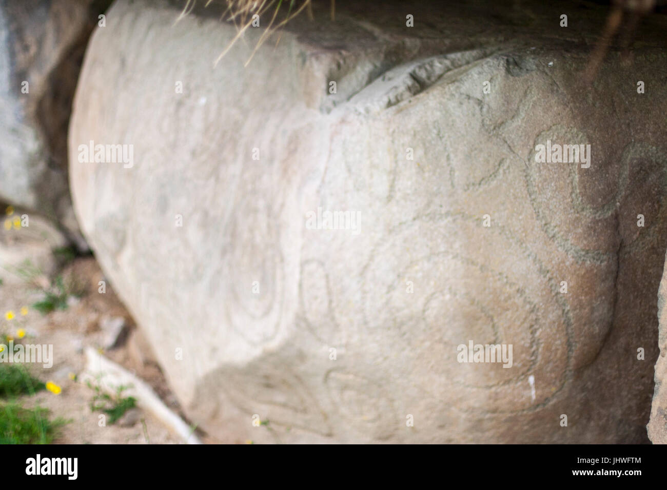 Neolithic art displayed on large stones, Kerbstones with spirals and ...