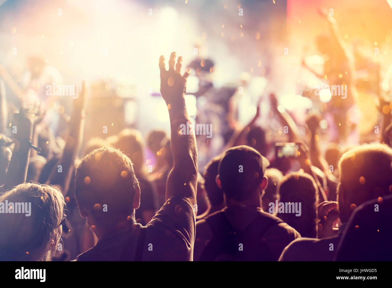 Many excited people enjoying concert hi-res stock photography and ...