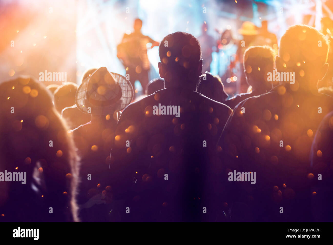 Photo of many people enjoying rock concert, audience applauding to ...