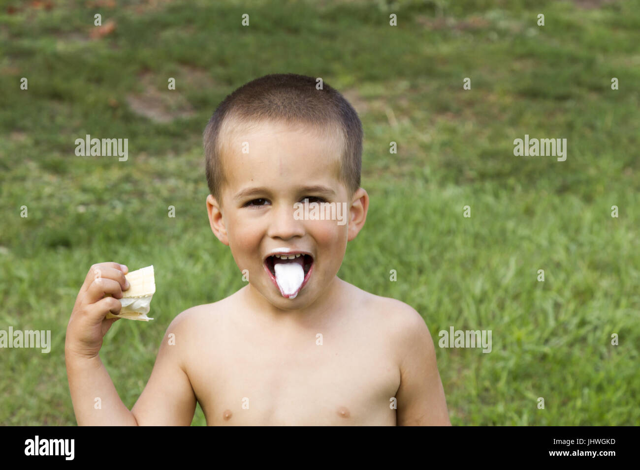 three-year-old-boy-eating-ice-cream-stock-photo-alamy